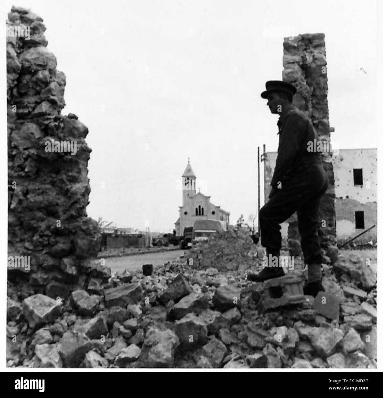 A view of bomb-damaged Tobruk in North Africa shows a church remaining ...
