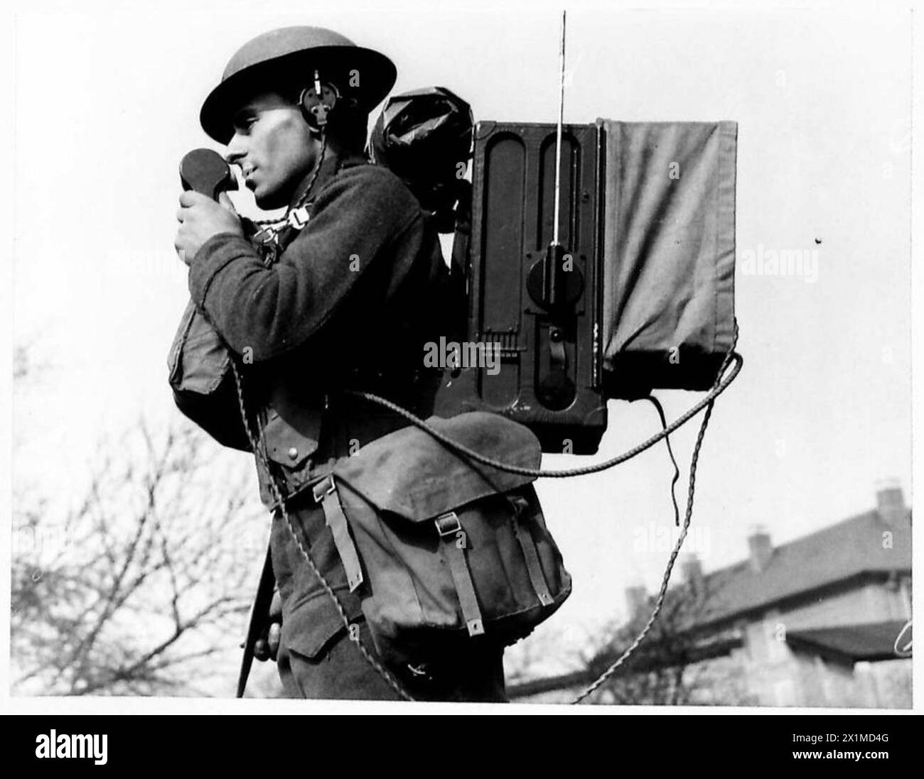 A British Army infantryman carries a wireless set as part of field ...