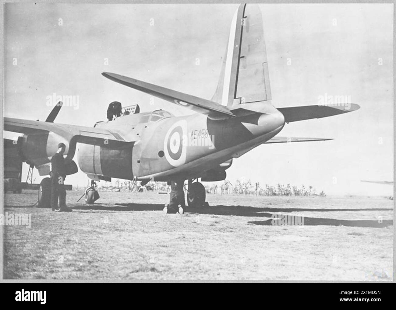 DUKE OF KENT SEES NEW R.A.F. AIRCRAFT - [1099] The tail surfaces of the ...