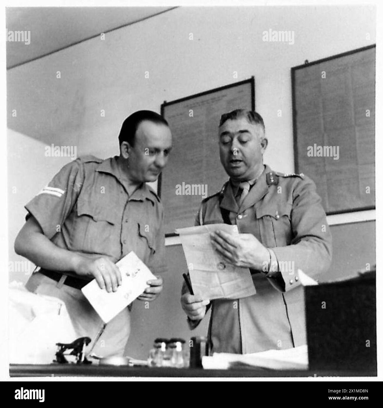 Captain K.G. Psaros, A.D.C., attends the Greek Commander-in-Chief at ...