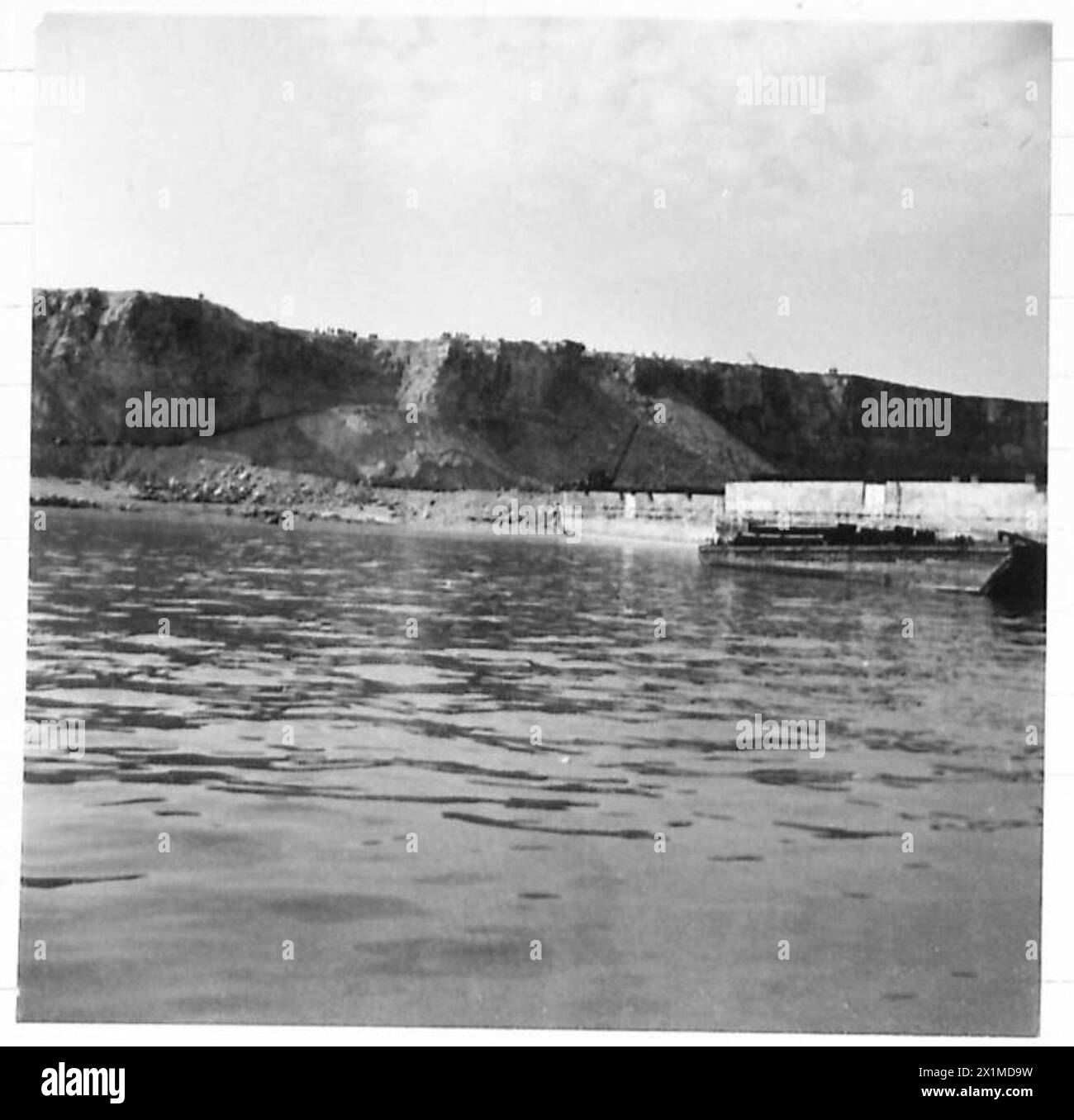 PHOTOGRAPHS OF PREFABRICATED PORT, ETC. - Demolition of cliff to ...