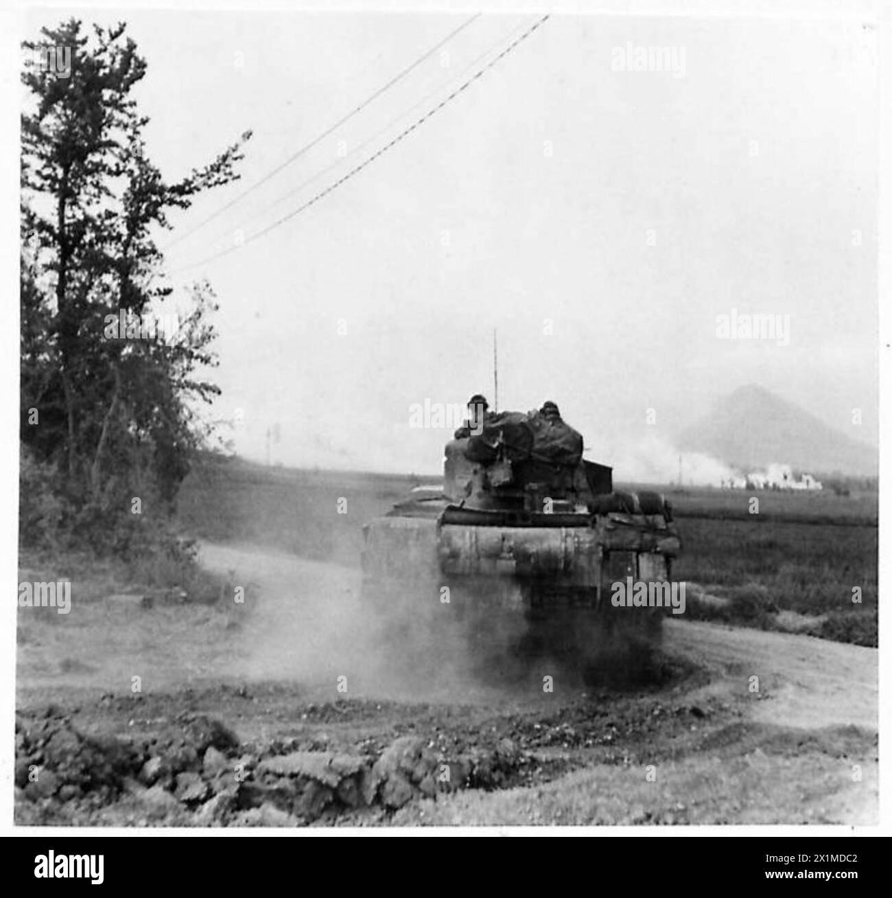 Churchill tanks of the British Army are advancing into position during ...