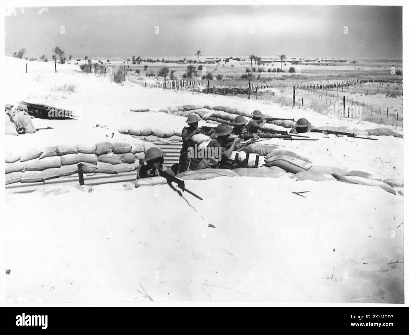 SCOTS IN THE DESERT - Scottish troops at firing practice in one of the ...