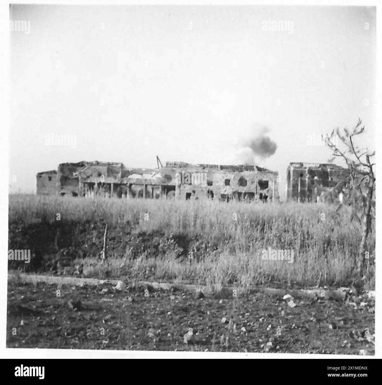 High-explosive shells fired by British Army units burst on the ...