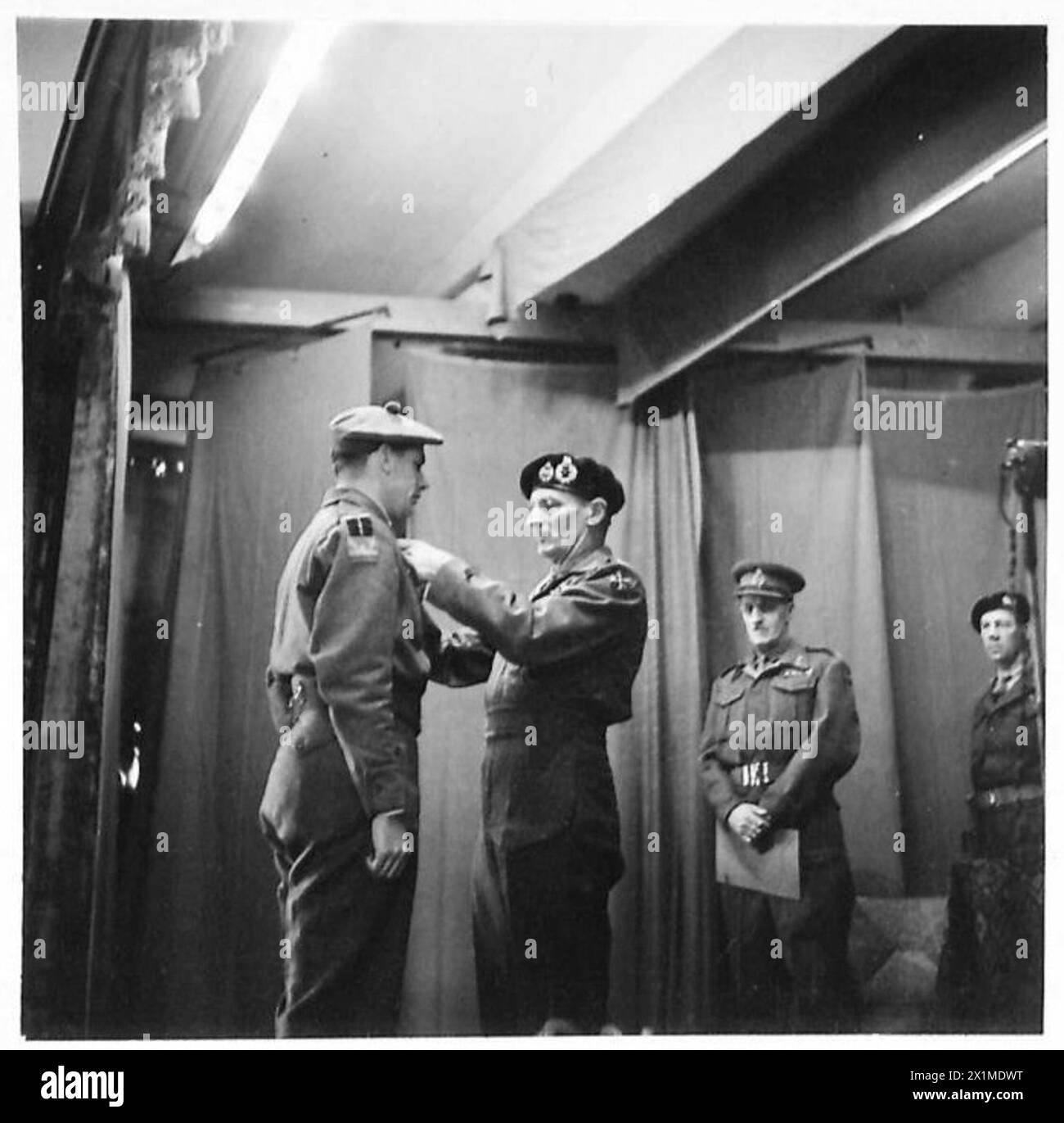 Major C.R.H. Kindersley of 1 HLI received the Distinguished Service ...
