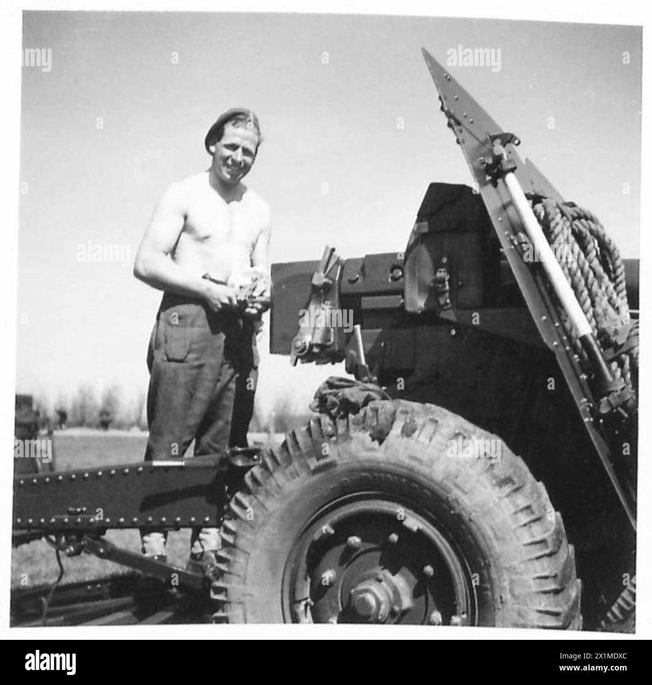 Lance Sergeant Russ of London is pictured with his weapon while serving ...