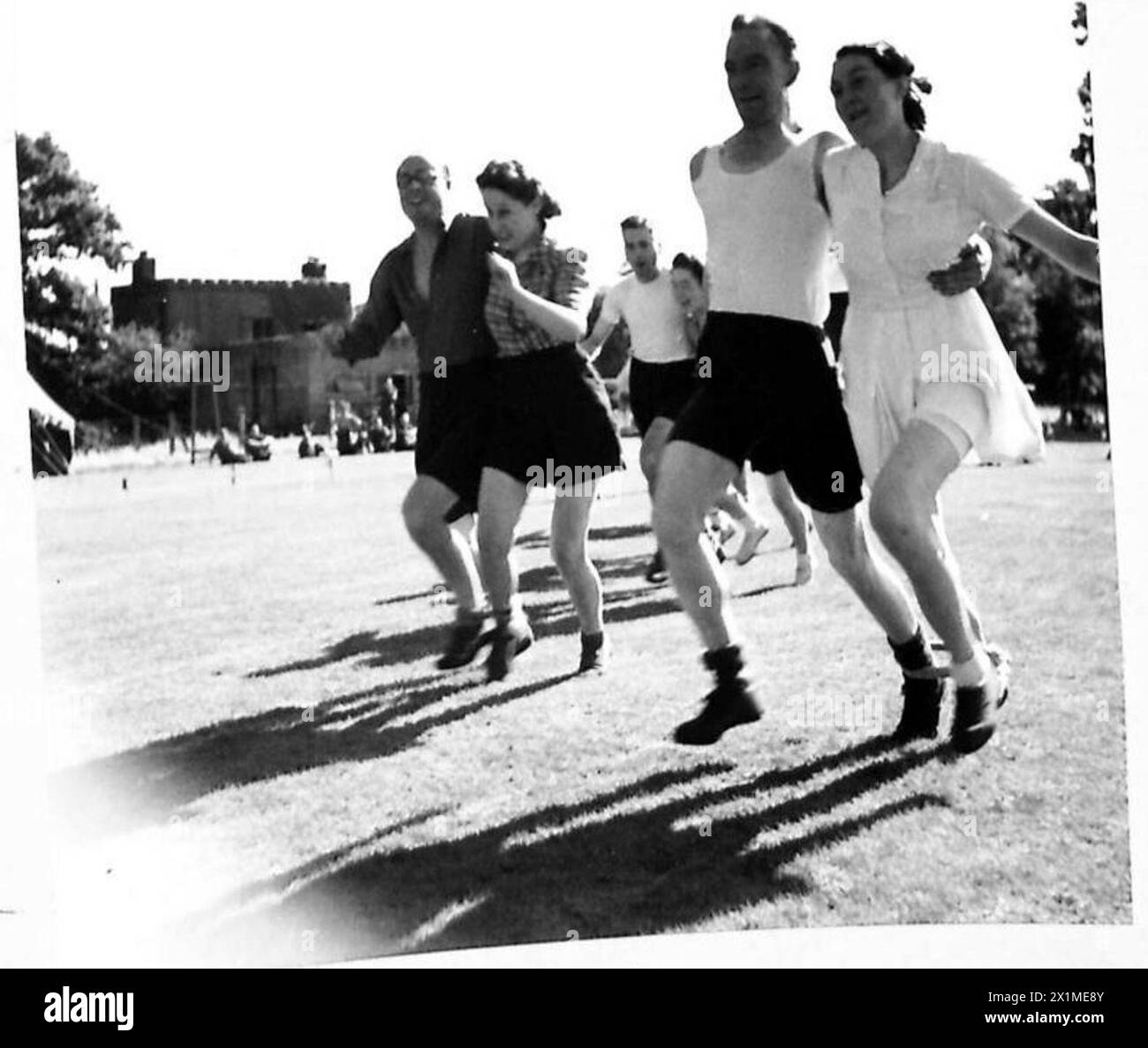 3 legged race Black and White Stock Photos & Images - Alamy