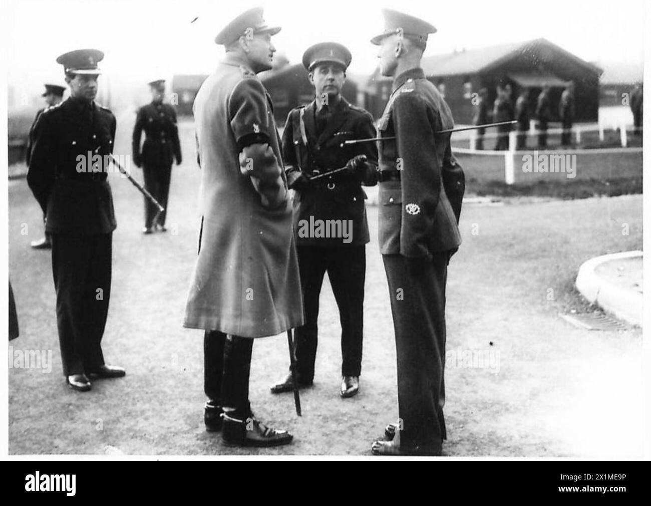 Brigadier Sir Percy Laurie inspecting Military Police and discussing ...