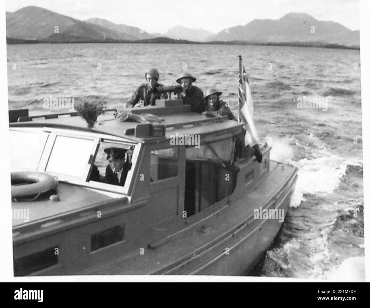 A British Army motor boat patrol for Scottish lochs shows the crew and ...