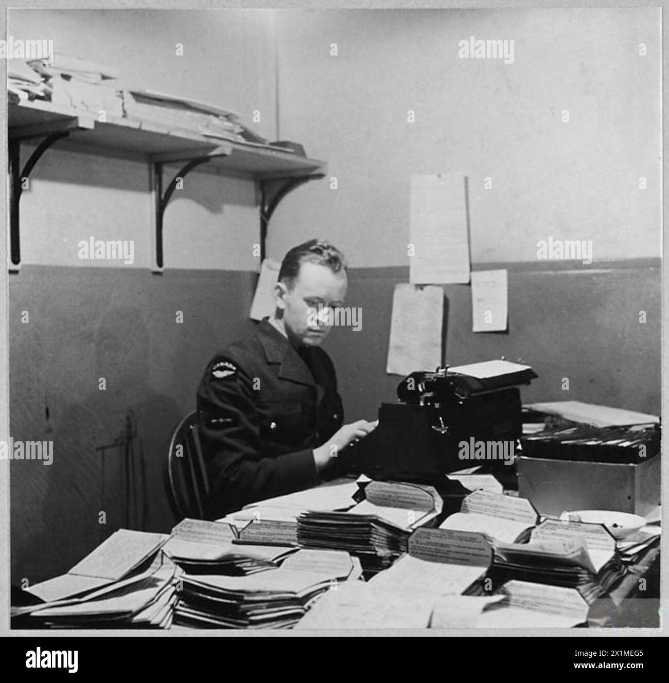 Leading Aircraftman Edmund Christopher works in the squadron offices of ...
