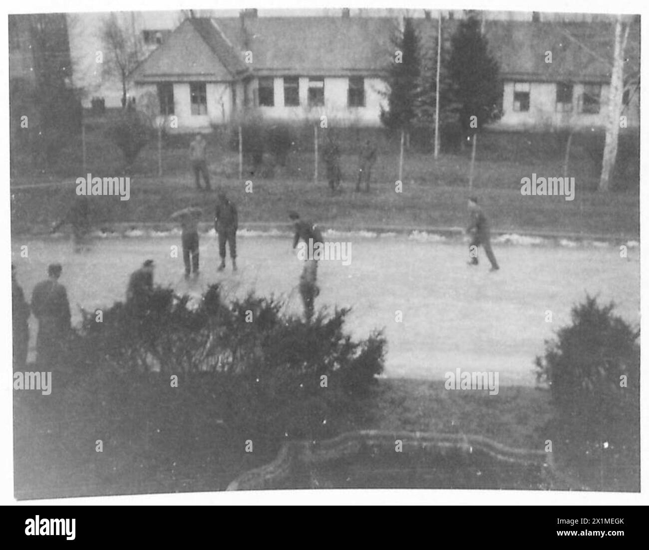 P.O.W. LIFE IN GERMANY - British POW officers skating on the ice at ...