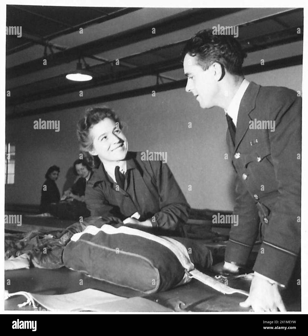 PARATROOPS IN TRAINING - RAF Parachute Officer watches WAAF parachute ...