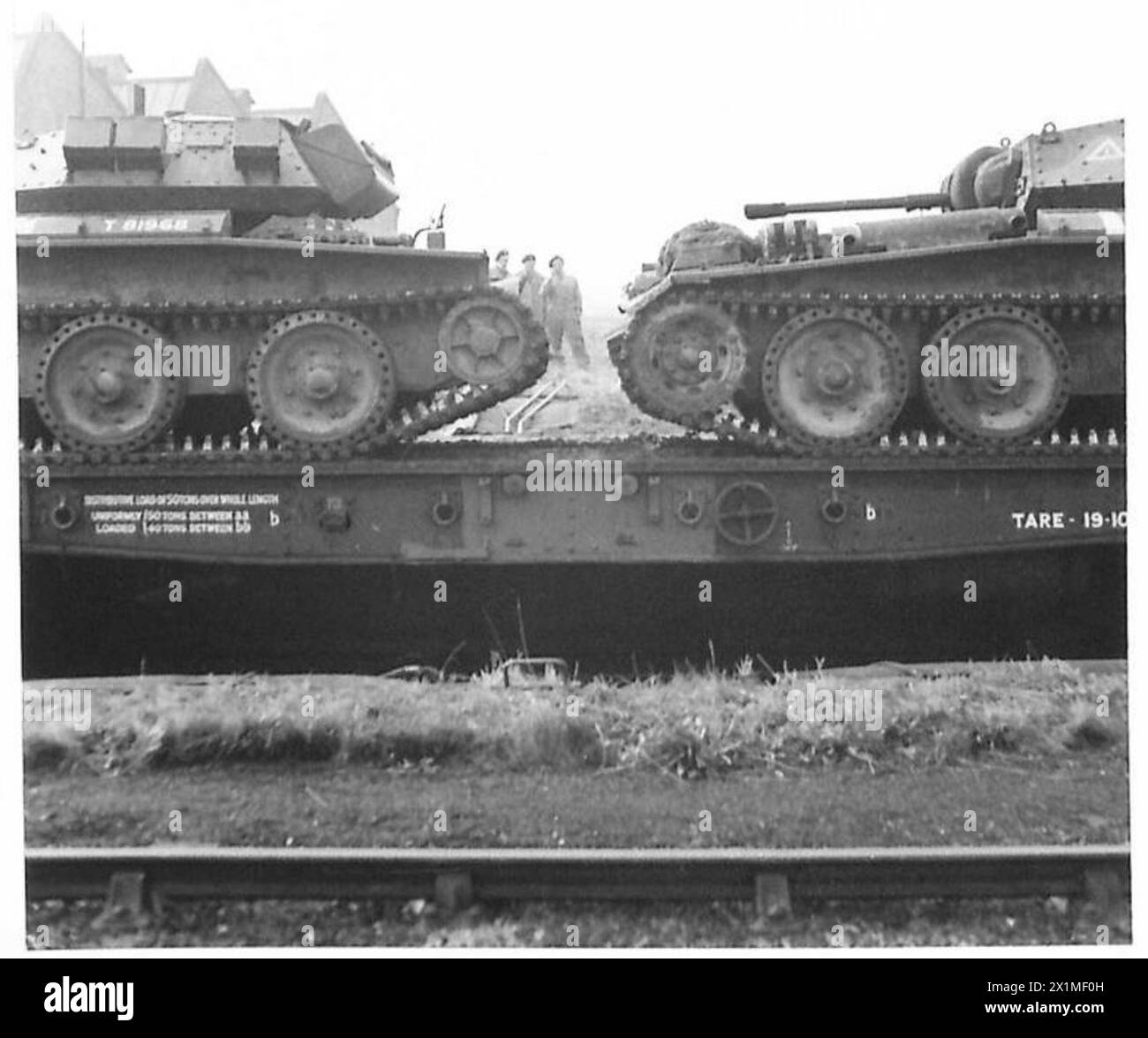 Tanks positioned on warflats are photographed without camouflage ...