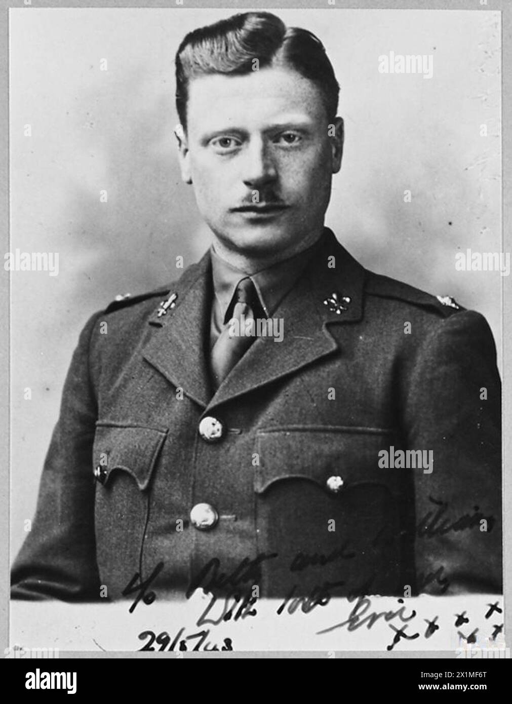 Captain Eric Harrison, aged 28, serves with the Manchester Regiment in ...