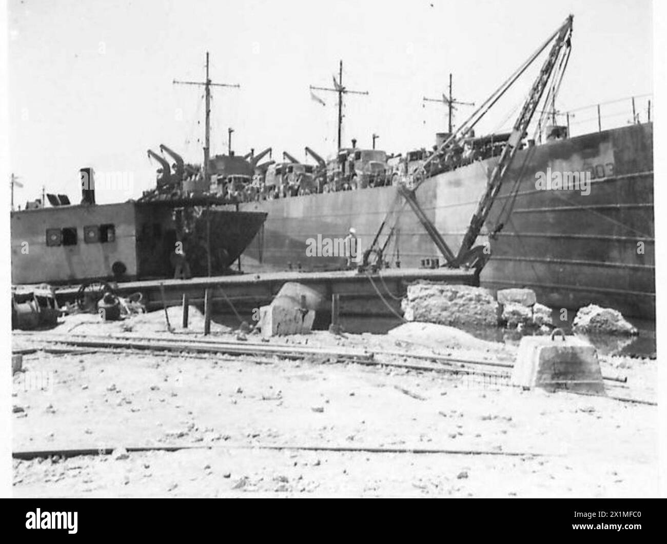 LOADING LANDING CRAFT IN SOUSSE HARBOUR - Loading landing craft in ...