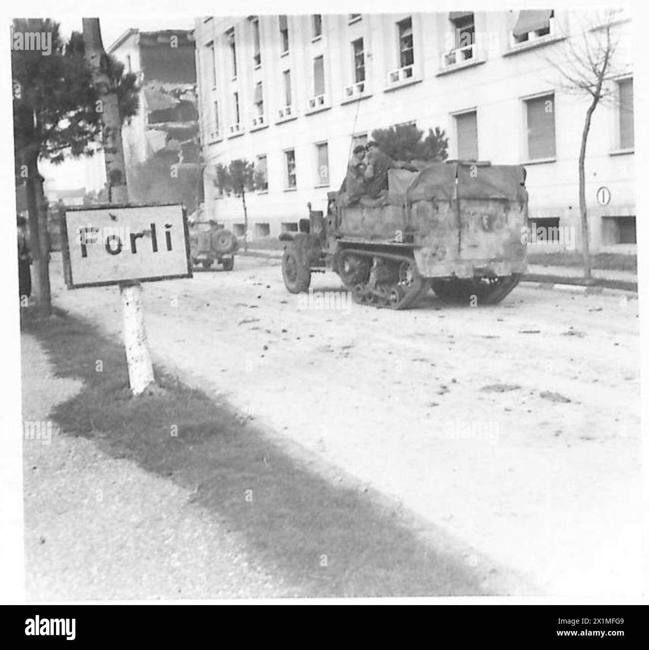 EIGHTH ARMY : ENTRY INTO FORLI - British armoured vehicles pass into ...