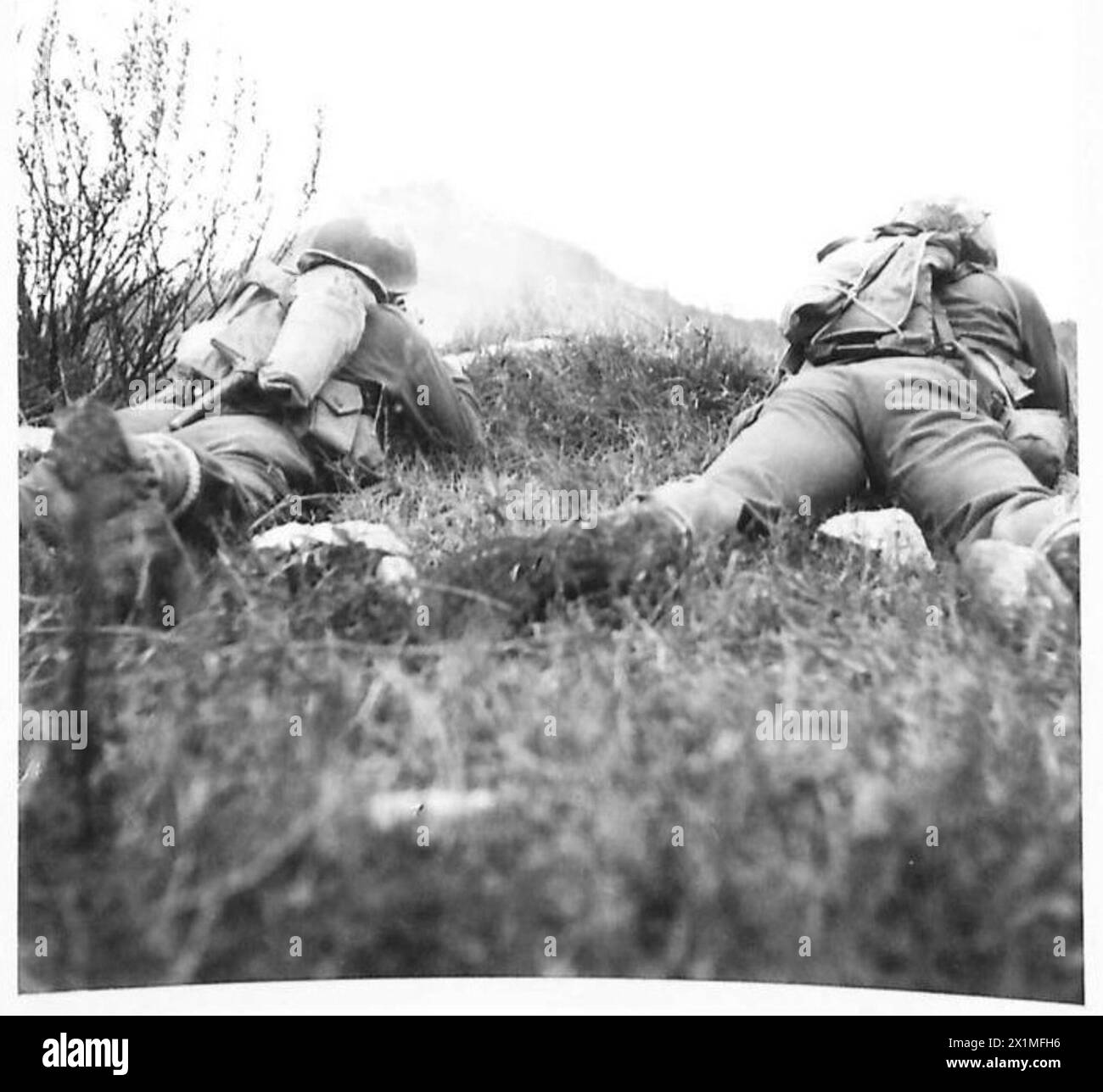 Soldiers of the 3rd Battalion The Rangers provide covering fire with ...