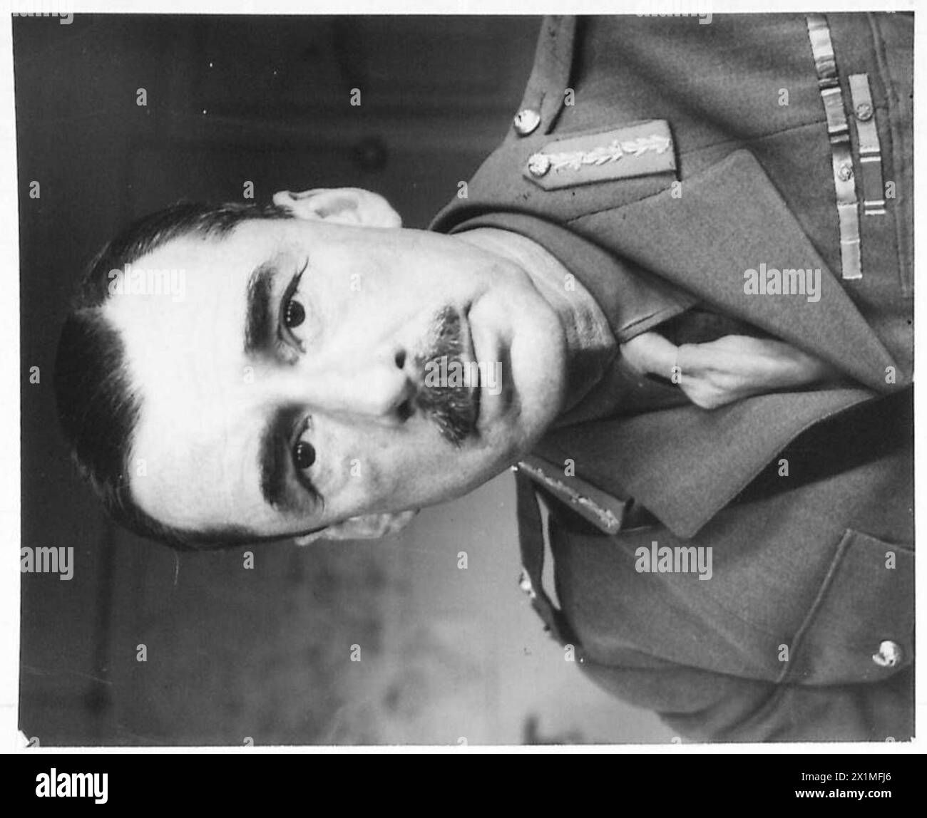 G holding Black and White Stock Photos & Images - Alamy