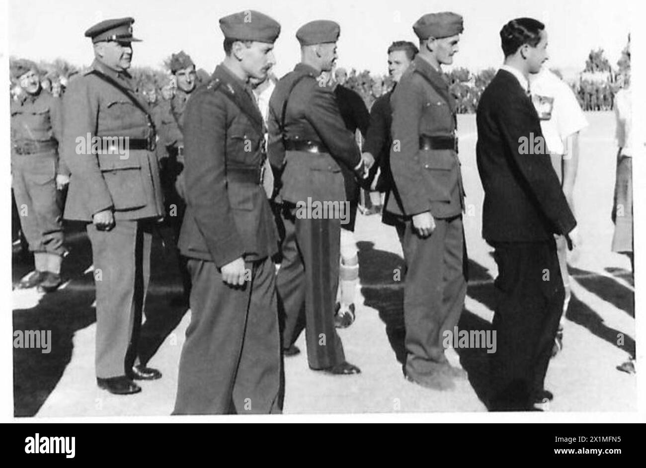 The Regent of Iraq inspects the Polish football team in Baghdad before ...
