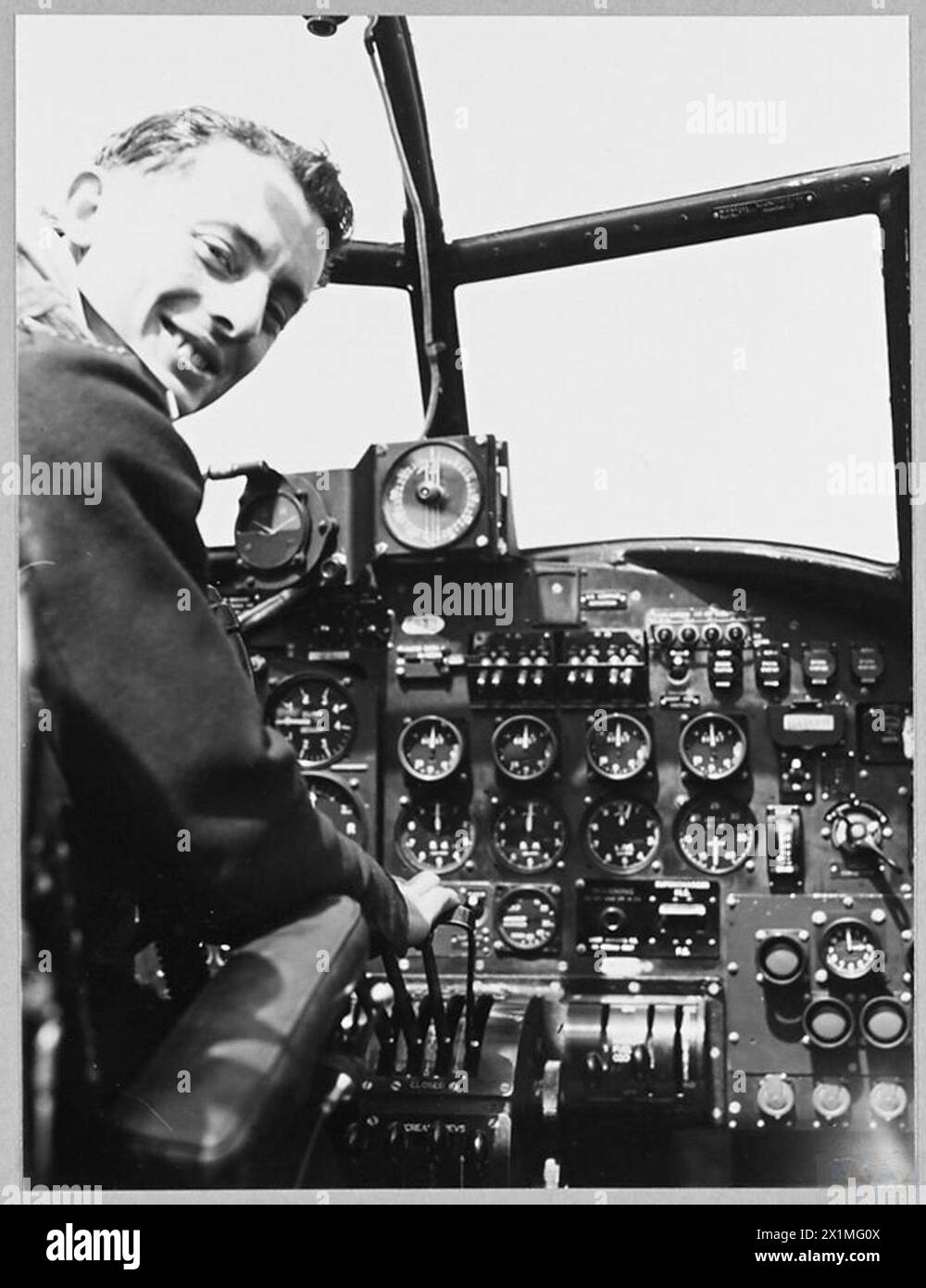 An Australian airman is in the cockpit of Lancaster 'N' for Nuts, which ...
