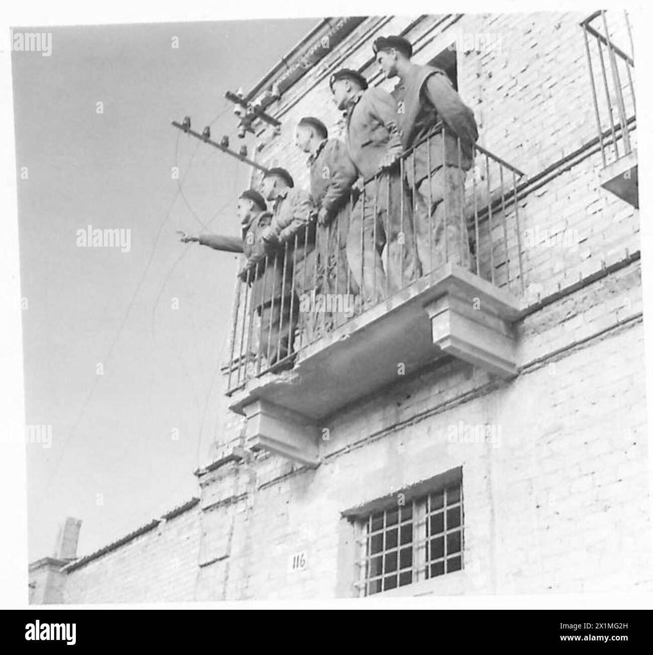 ITALY : EIGHTH ARMYTHE LIFE OF A TANK MAN - The crew look over the town ...