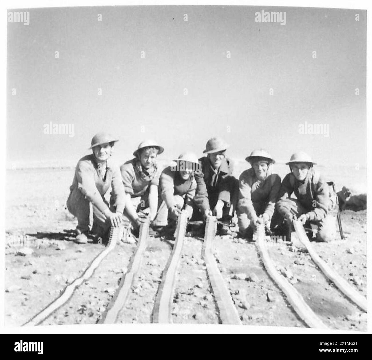 Soldier loading gun in Cut Out Stock Images & Pictures - Alamy
