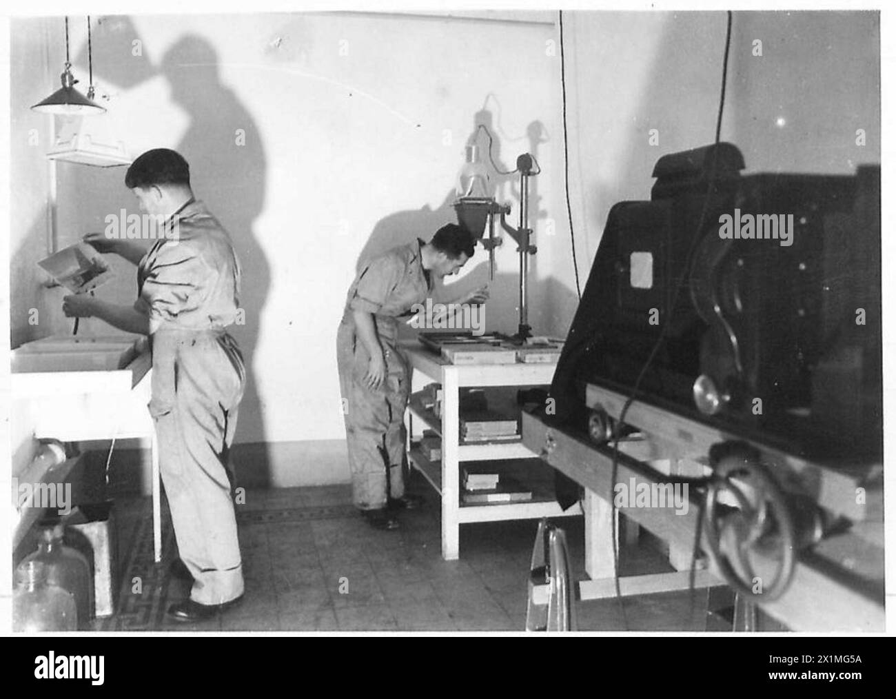 THE ARMY FILM AND PHOTOGRAPHIC UNIT - Enlarger of various types are ...
