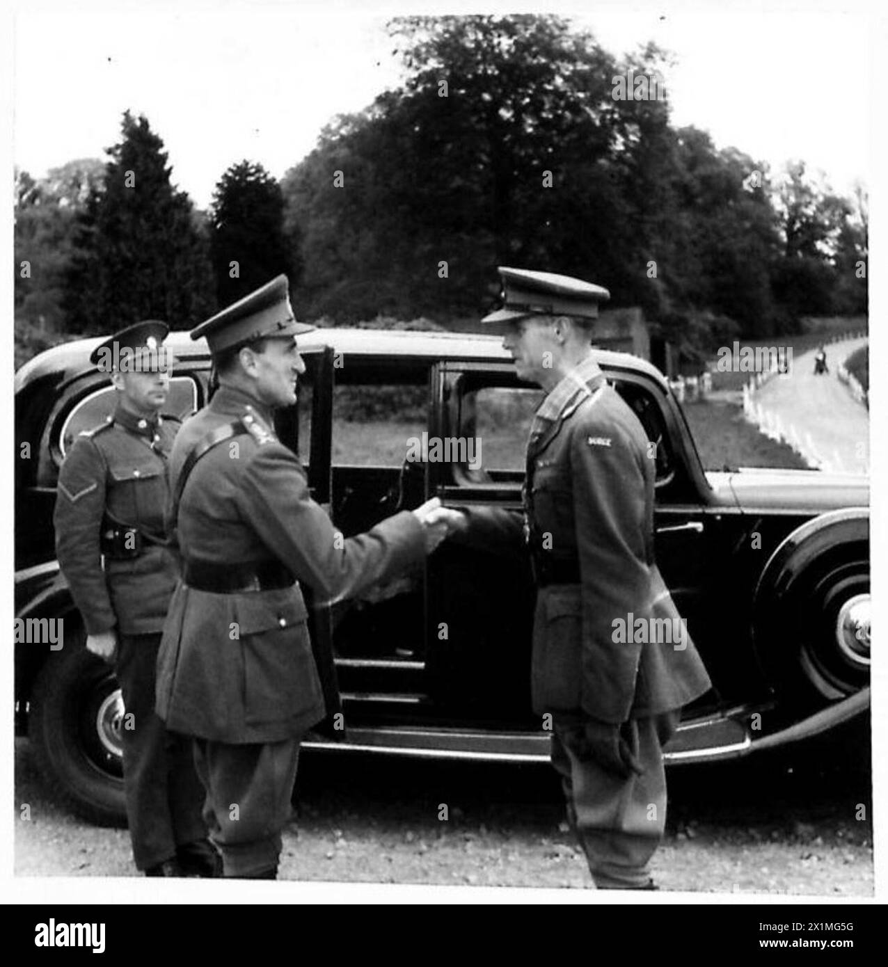 The Commander-in-Chief shakes hands with Major General Oscar Strugstad ...