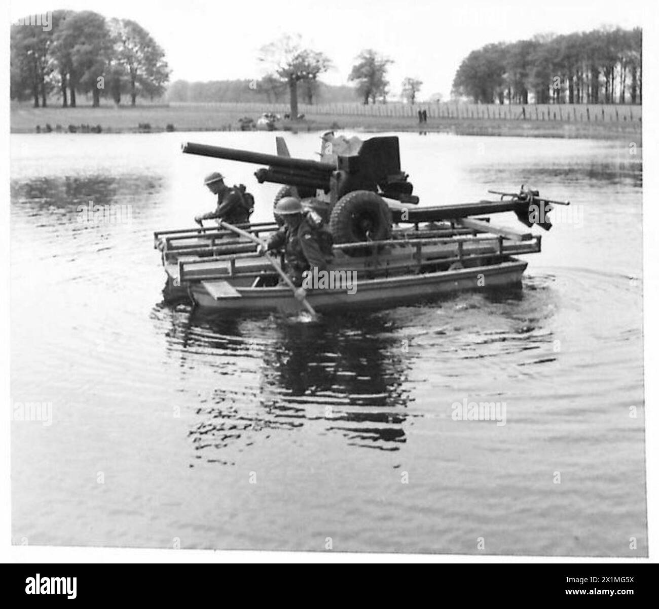FERRYING OF GUNS AND TRUCKS BY MEANS OF ASSAULT BOATS - A 6-pounder ...