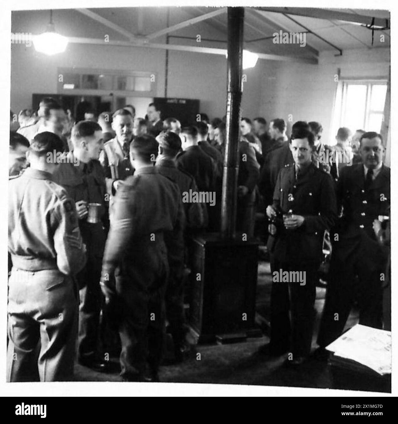 Officers of the Royal Tank Regiment entertain sergeants in the former ...