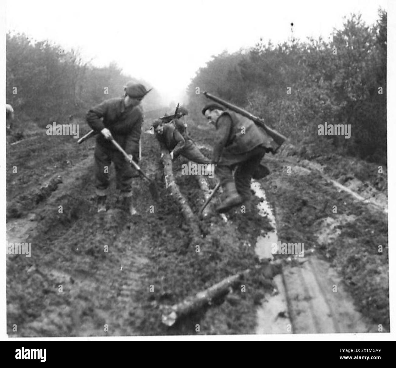 Sappers of 282 Field Company, Royal Engineers, 53rd Division, reinforce ...