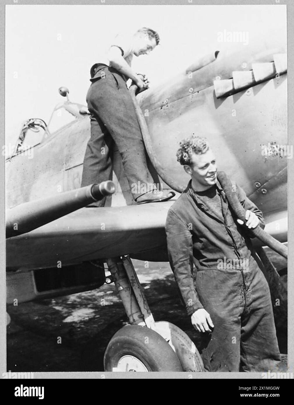 CEYLON SPITFIRE SQUADRON. - Picture (issued 1944) shows - Refuelling of ...