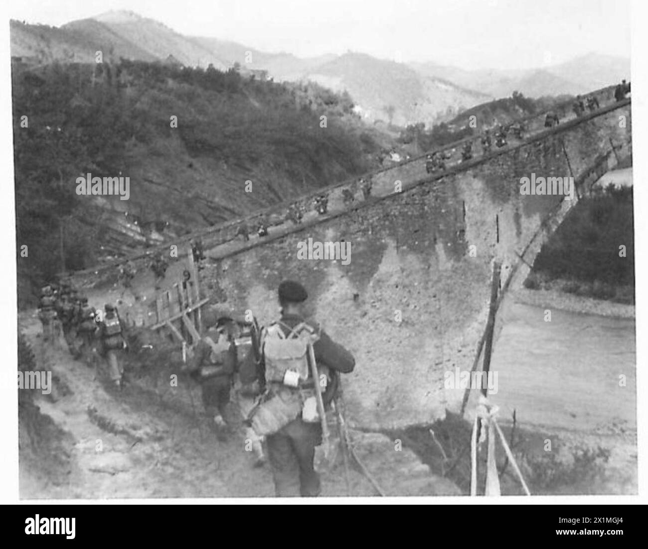FIFTH ARMY : VARIOUS - Men of the 3rd Grenadier Guards moving over a ...