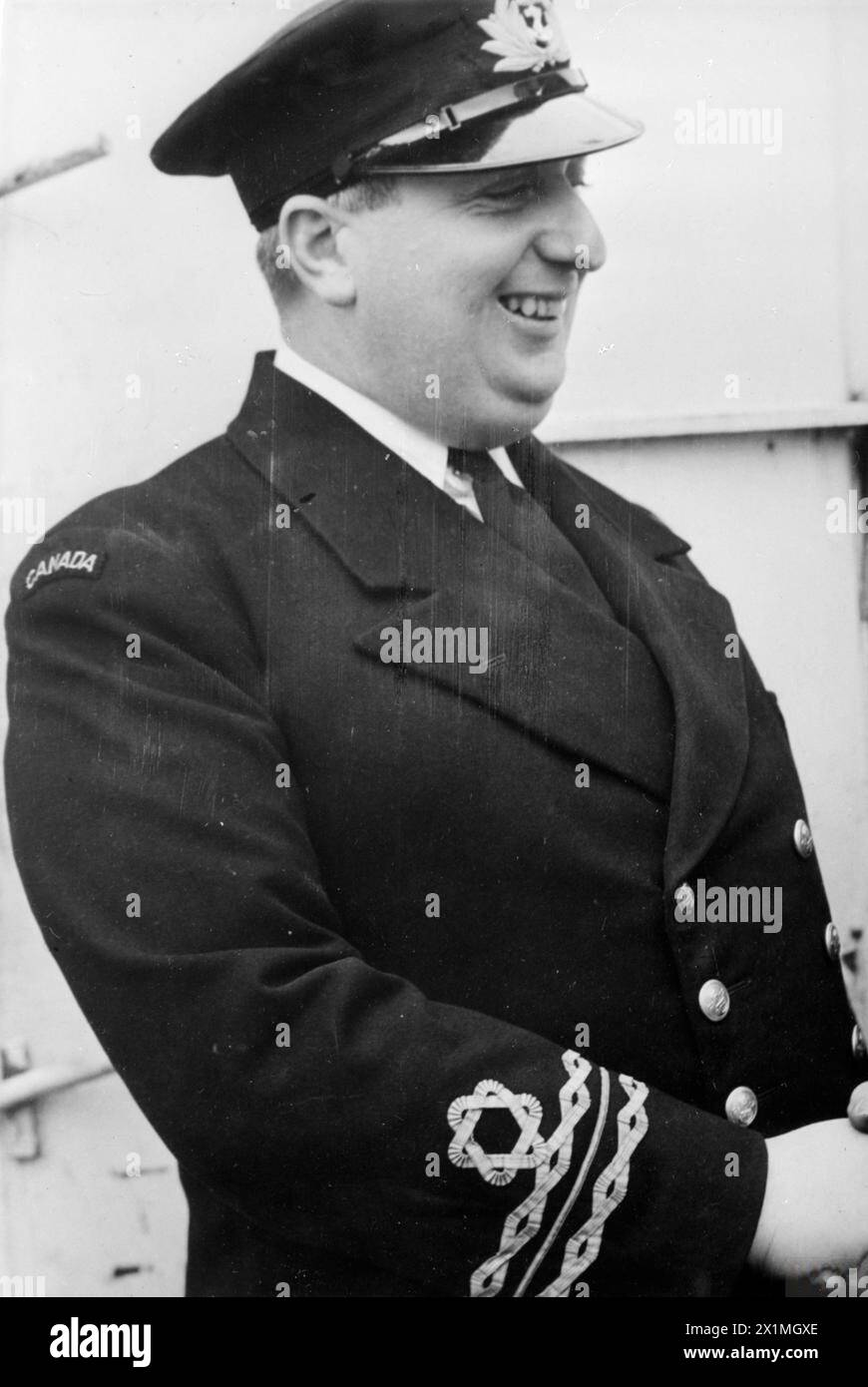 Acting Commander George H. Stephen, OBE, DSC and Bar, RCNR, commanded ...