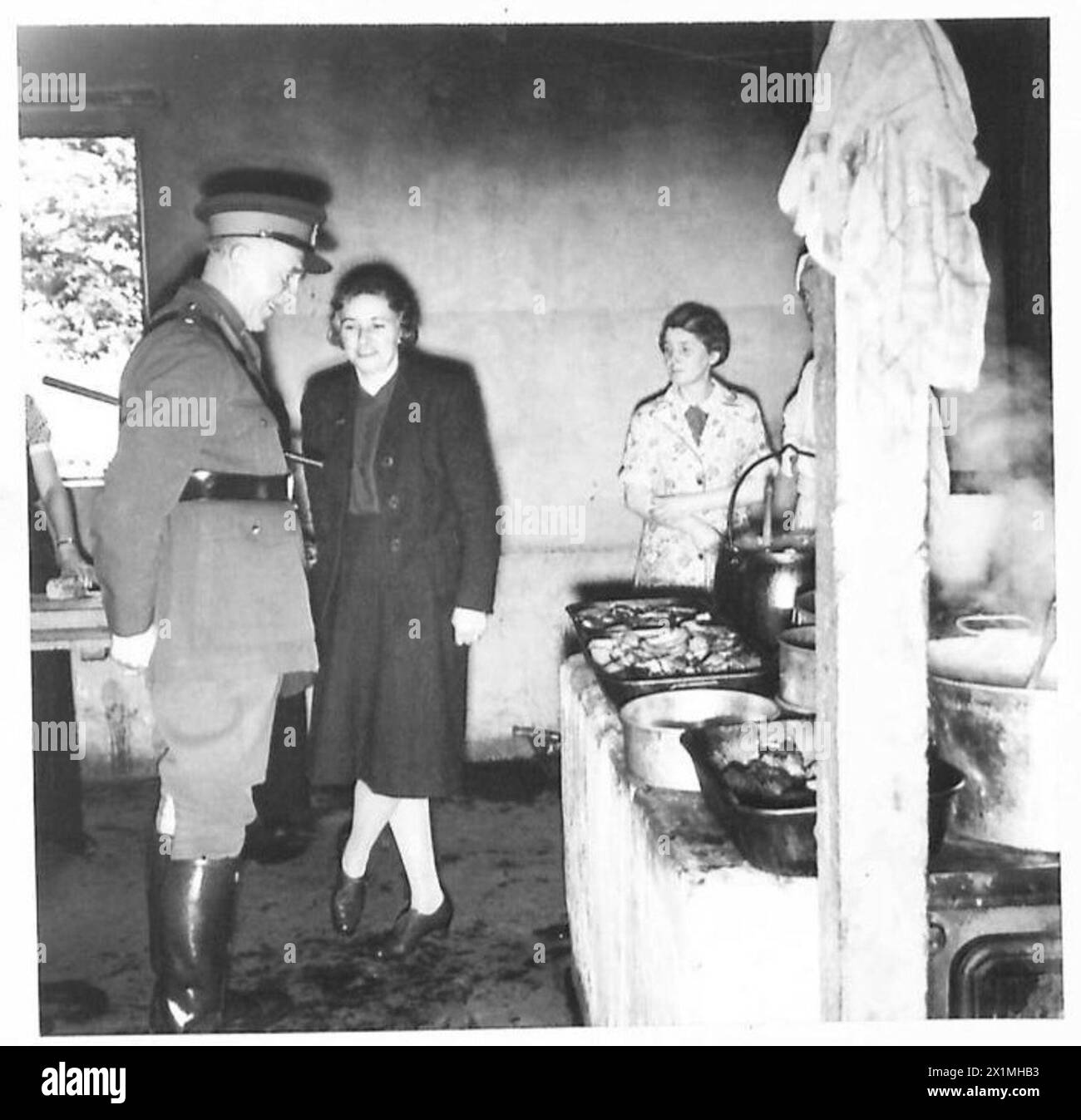 Lt. General Franklyn inspects the cookhouse at Ulster Home Guard Camp ...
