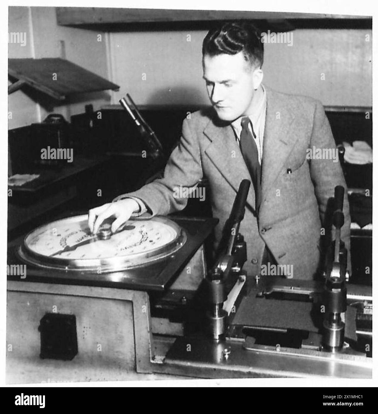 SCIENTIFIC TESTING OF ARMY TEXTILES - Testing cloth for strength. It ...