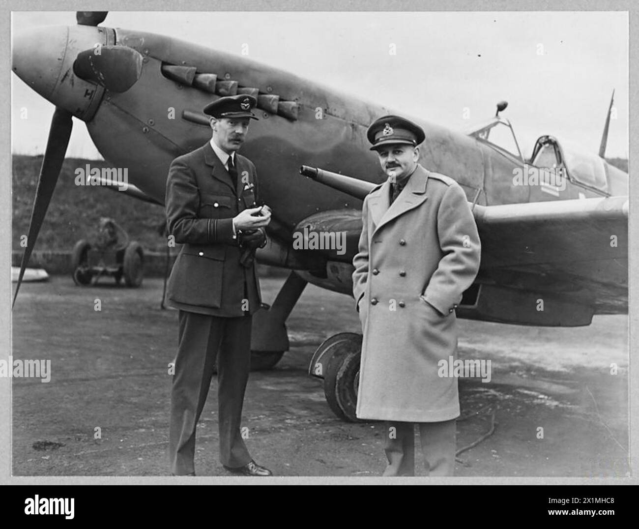 Sir Roger Lumley, former Governor of Bombay, presents the official ...