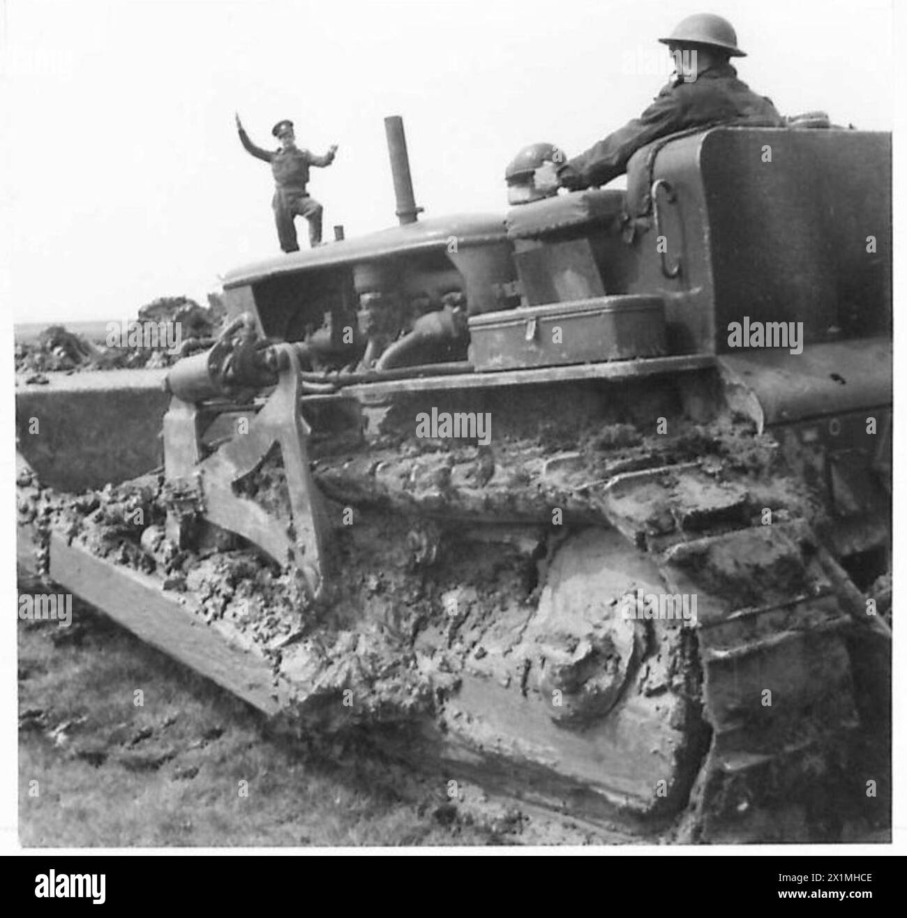 BRITISH ARMY USES AMERICAN "BULLDOZER" - A close up of the huge machine ...