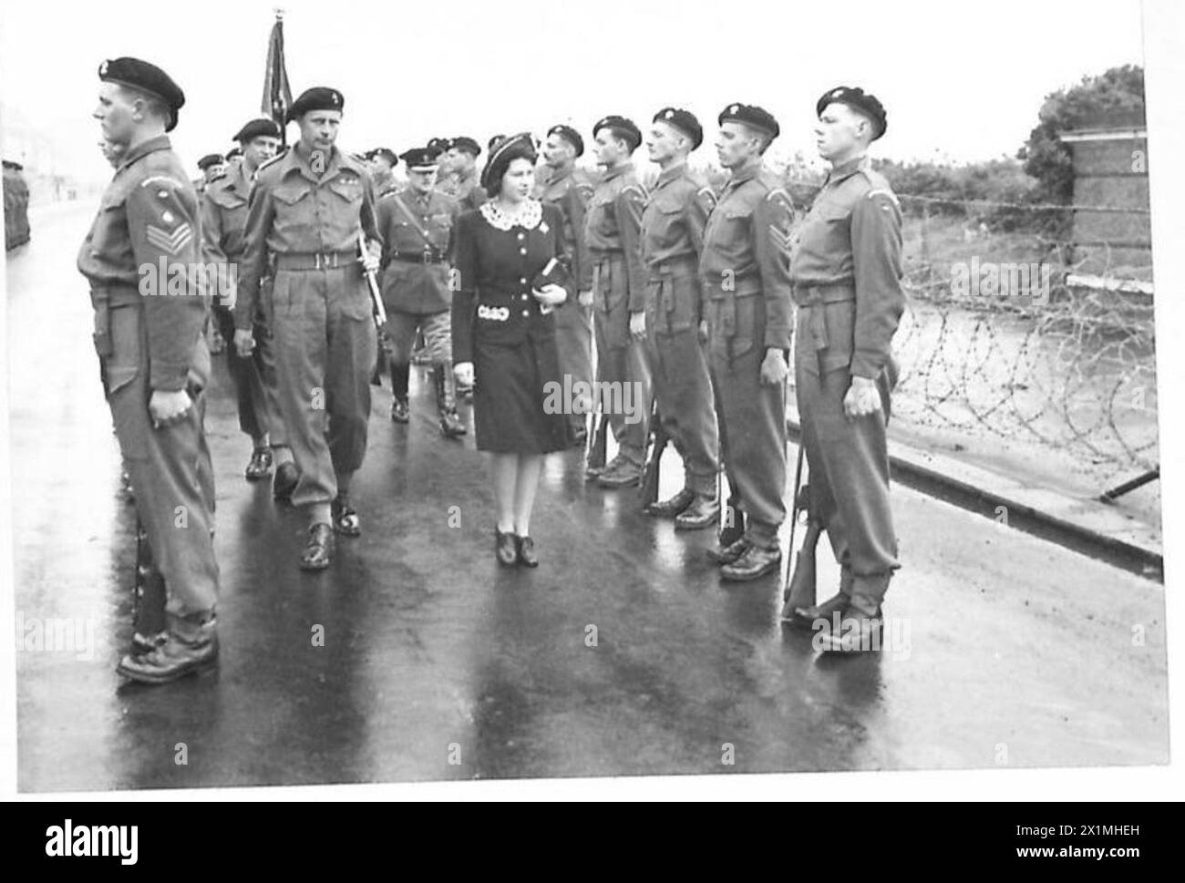 Princess Elizabeth inspects the Guards Armoured Division, passing ...