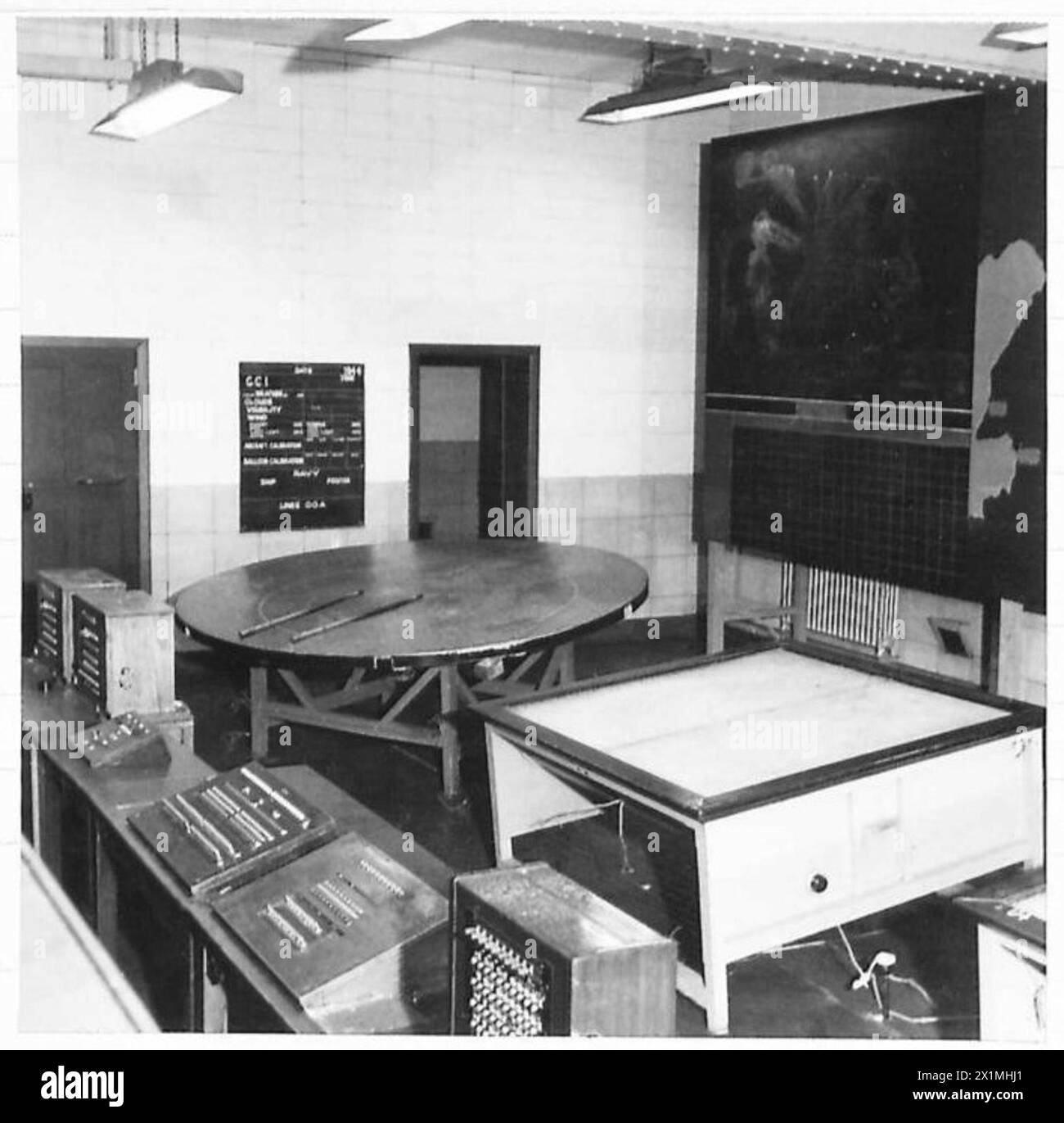 British Army photographs show the interior and personnel of a gun ...