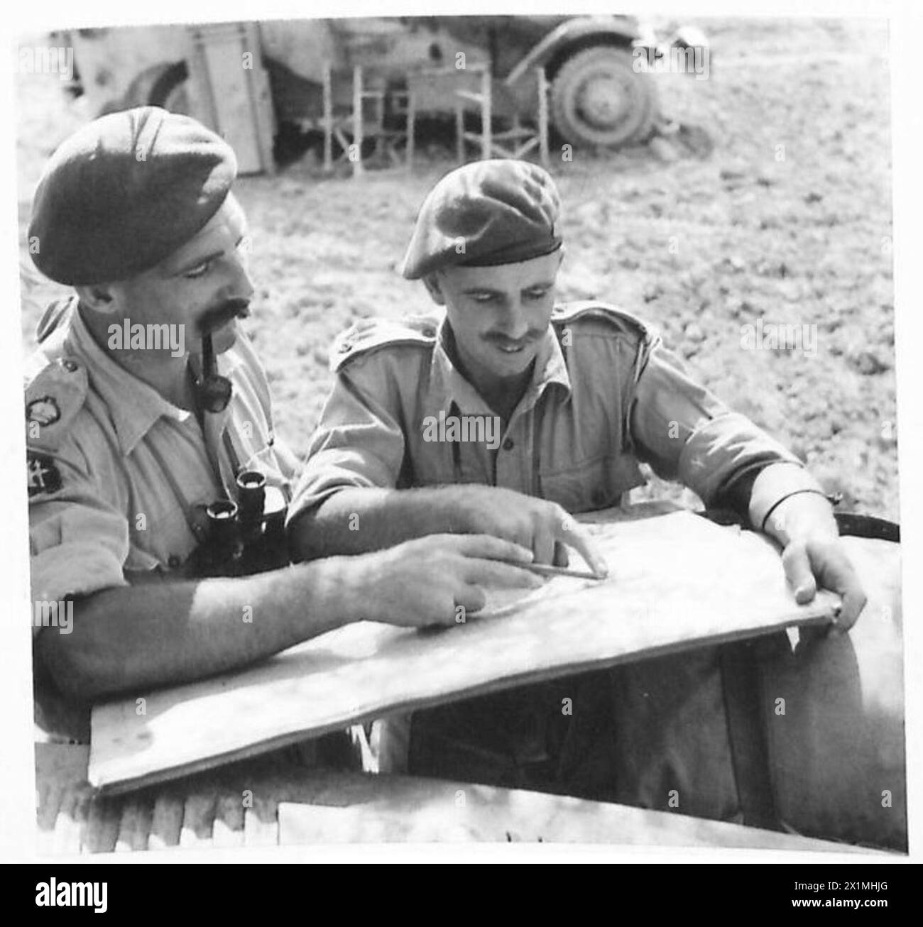 Officers of the 56th Reconnaissance Regiment review positions in Italy ...