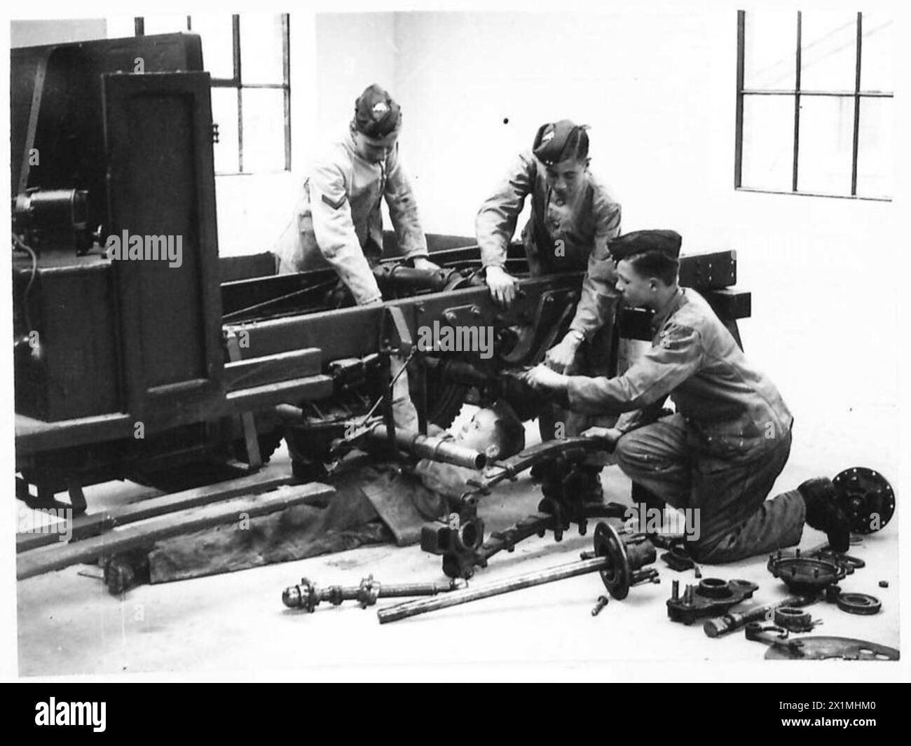 Apprentices at the R.A.O.C. School of Instruction at Hilsea work on ...