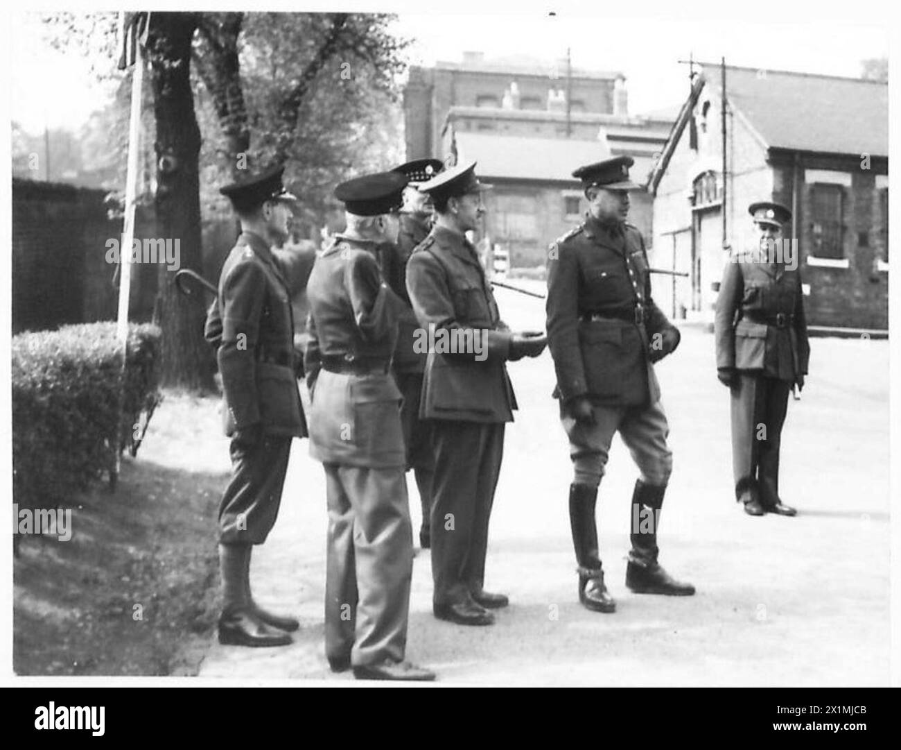 Brigadier Fox-Pitt observes the annual inspection and march past of the ...