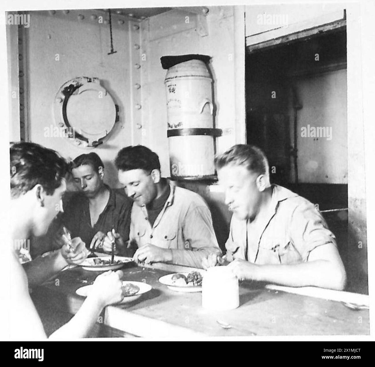 Crew on ship eating Black and White Stock Photos & Images - Alamy