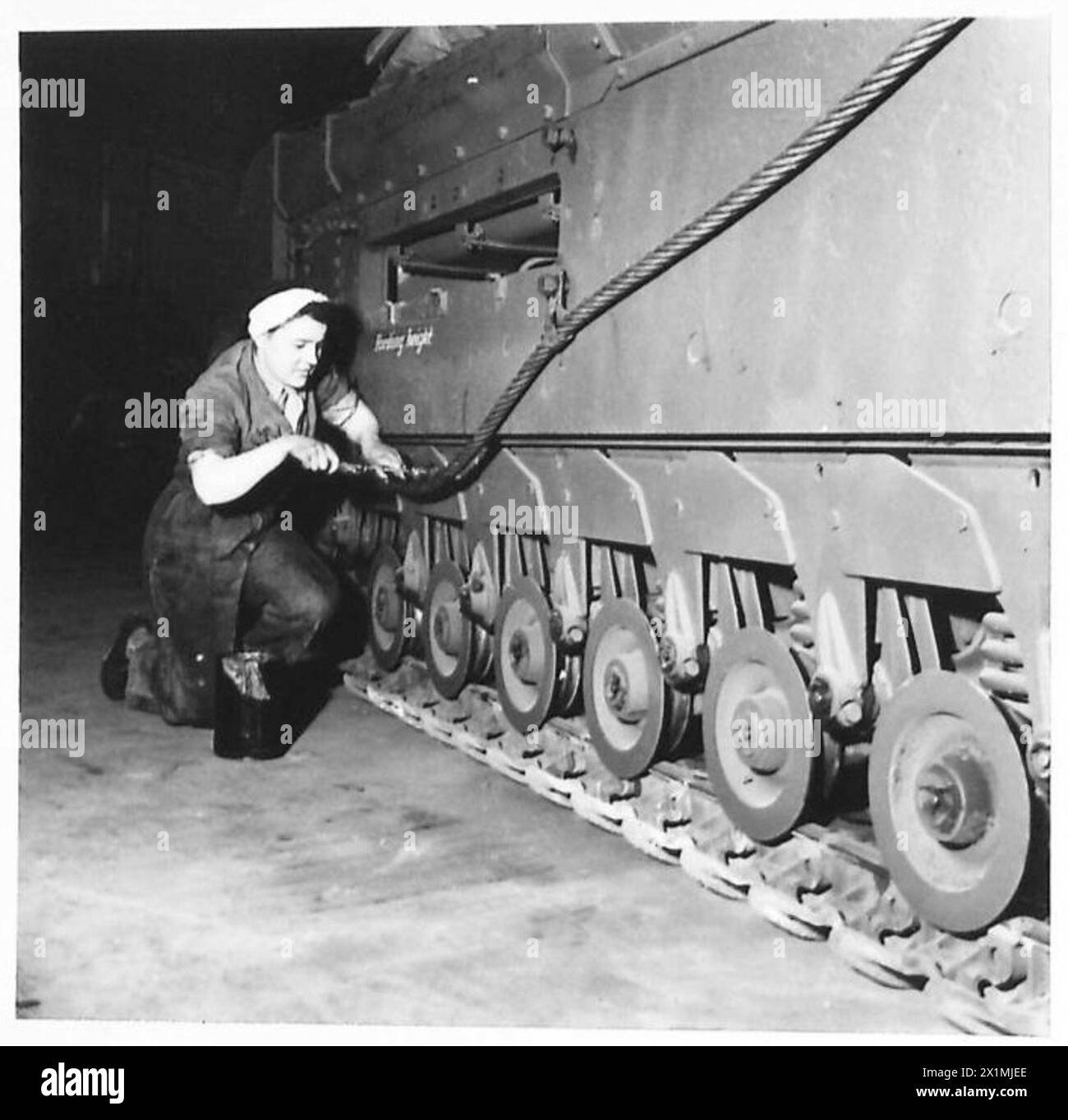 "SPECIAL TREATMENT FOR TANKS FOR RUSSIA" - ATS girls greasing the tow ...