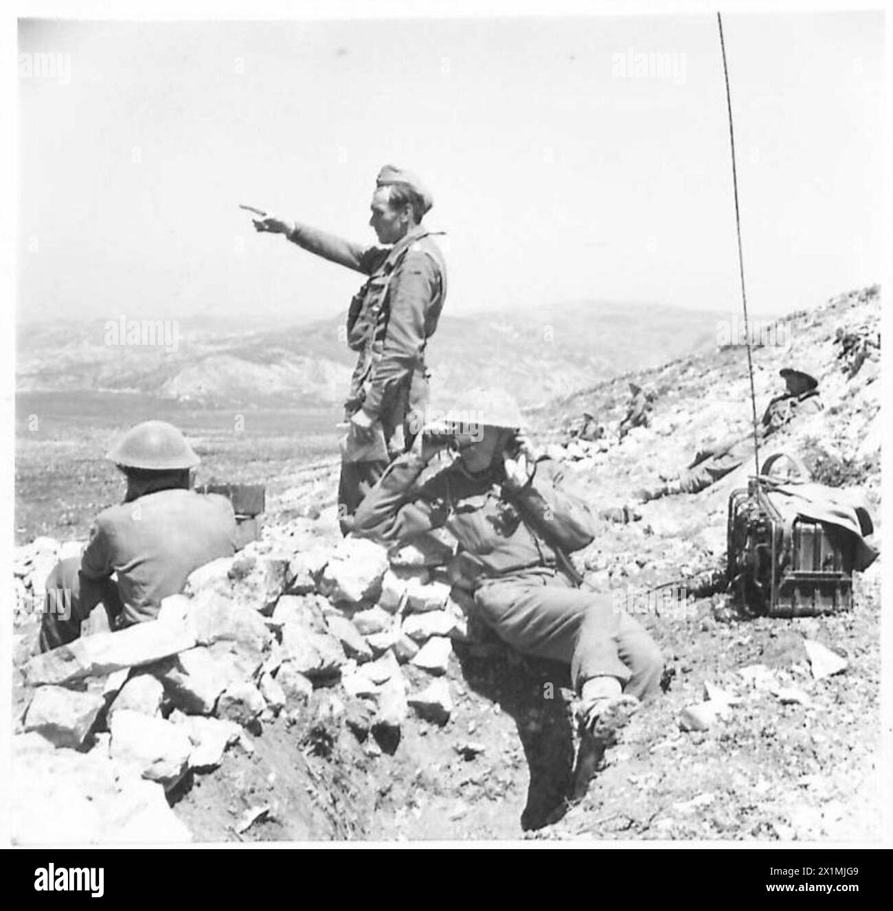 An officer at a forward observation post on Tangoucha directs an ...