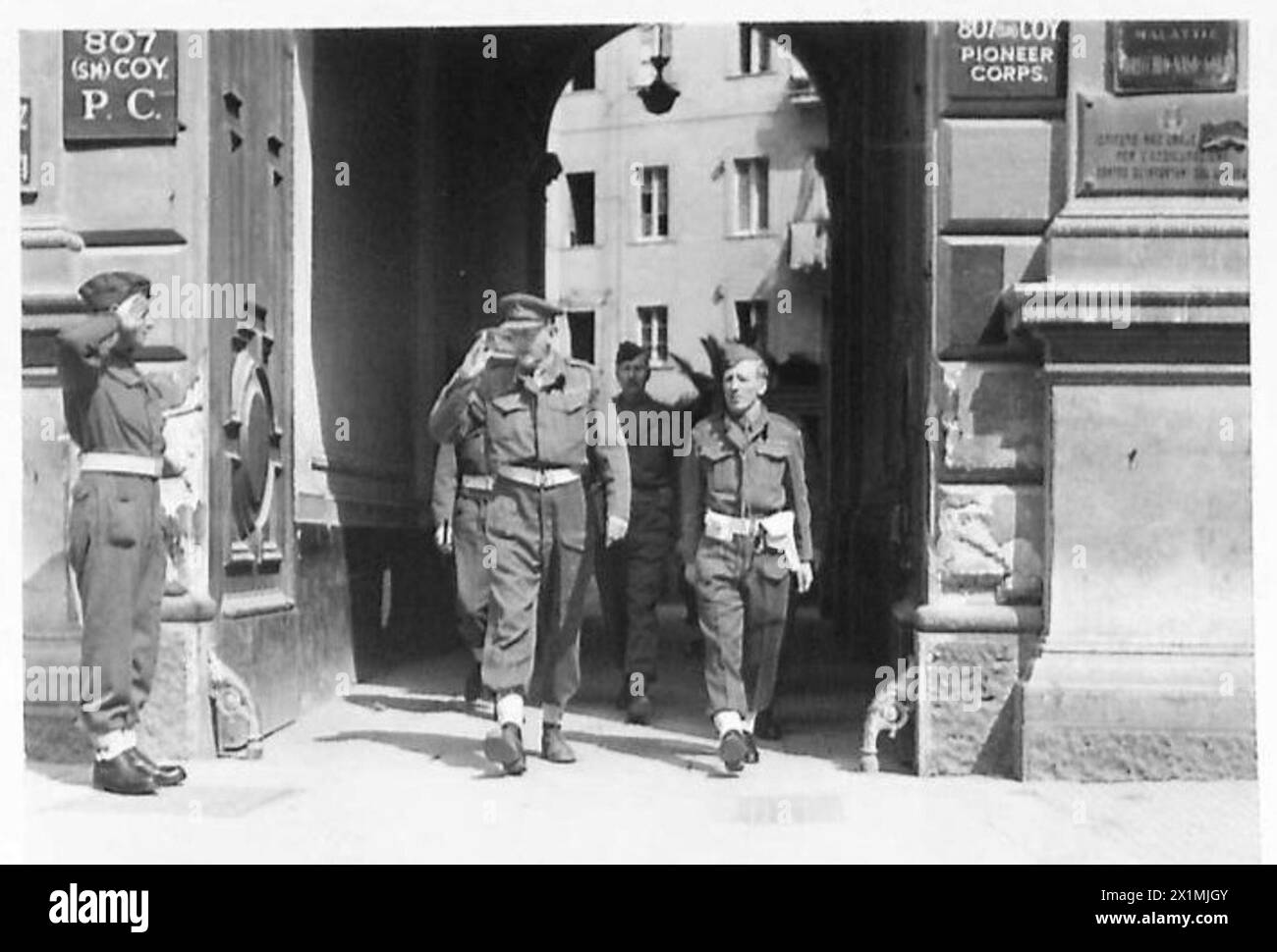 Major General Collier departs with Major J.T. Spinks, officer ...