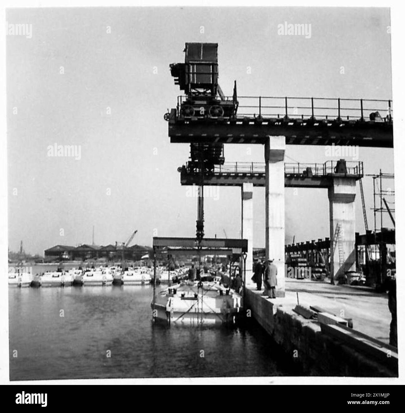 Photographs show 'Beetle' vehicles at West India Dock as part of a ...
