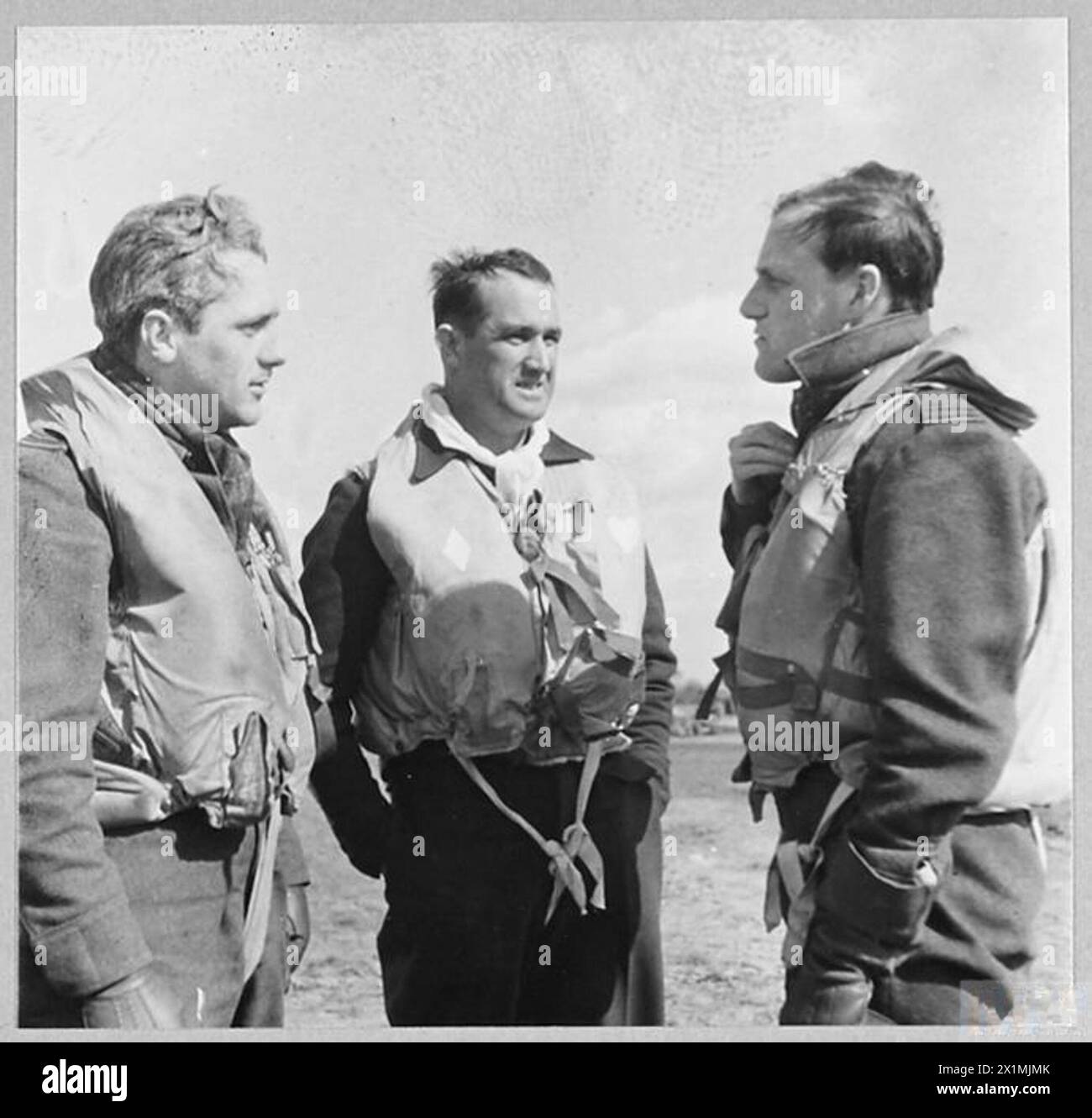 AN AUSTRALIAN FIGHTER SQUADRON IN BRITAIN [No.457 SQUADRON] - left to ...