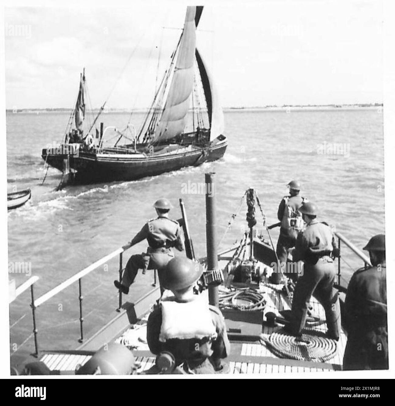 THE ARMY'S NAVY - The boarding party stand by ready to board the barge ...